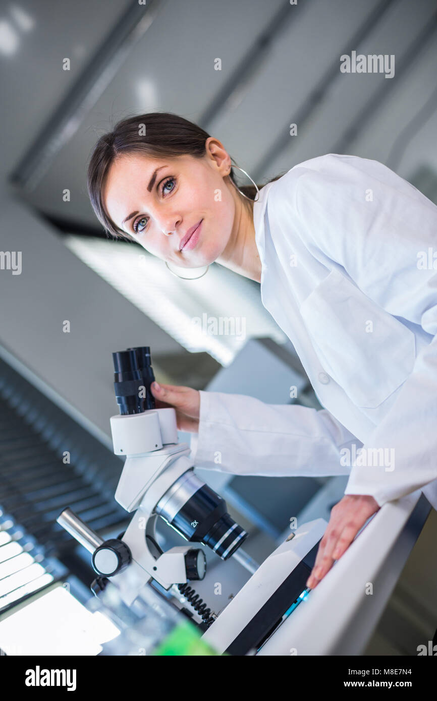 Portrait of a female chemistry student/scientist carrying out research ...