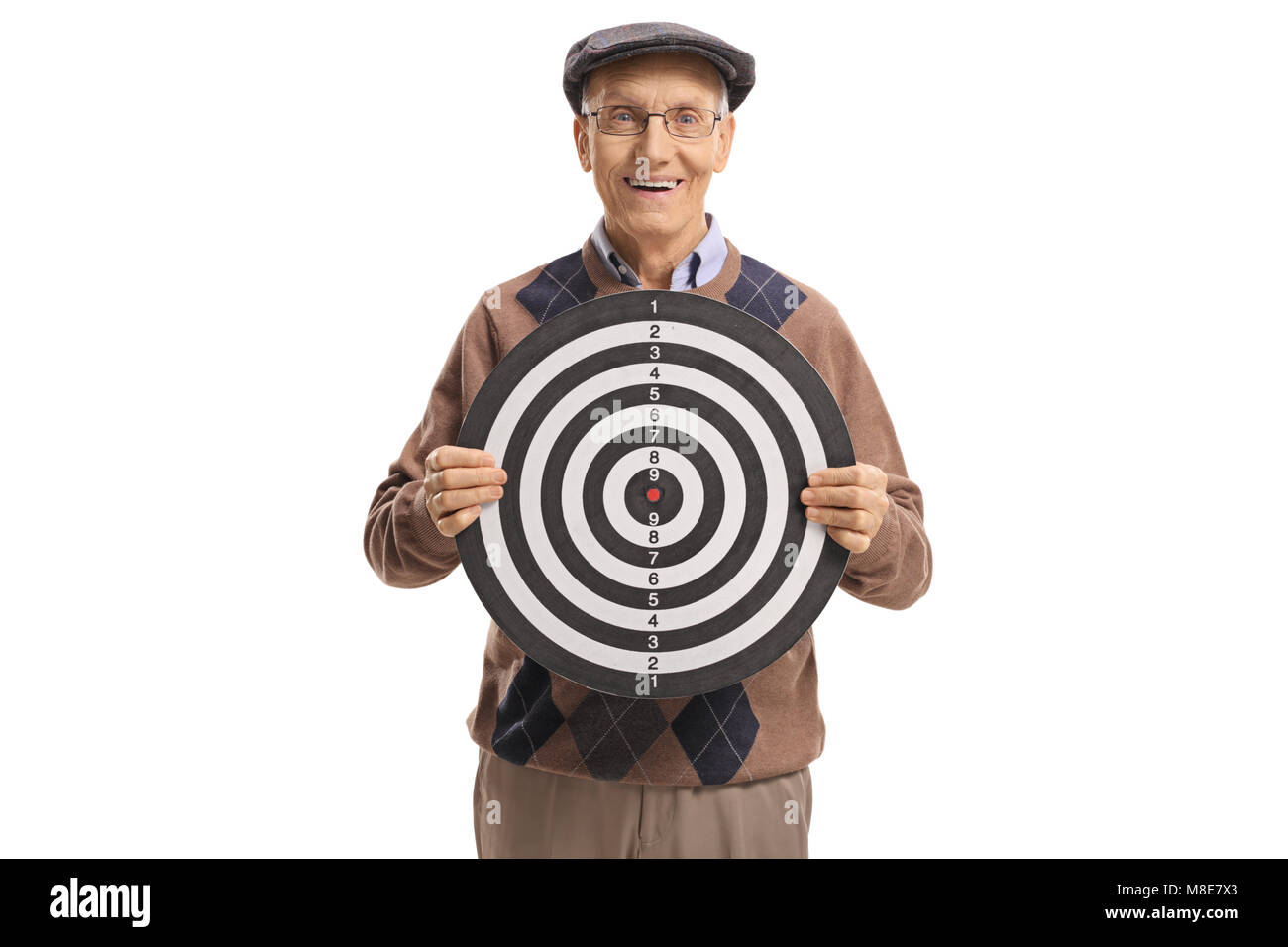 Elderly man holding a target and smiling isolated on white background ...