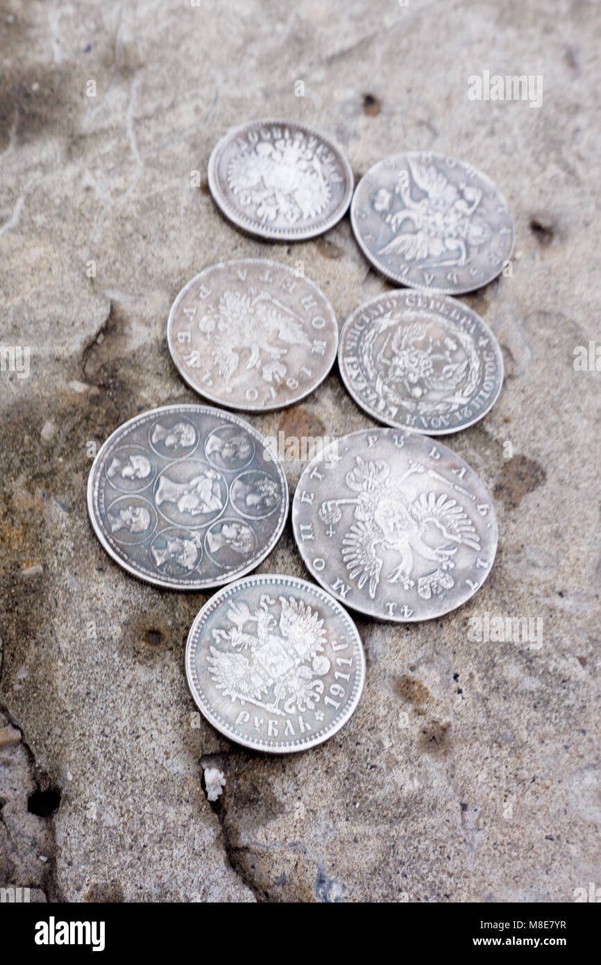 trove of ancient medieval coins silver background Stock Photo - Alamy