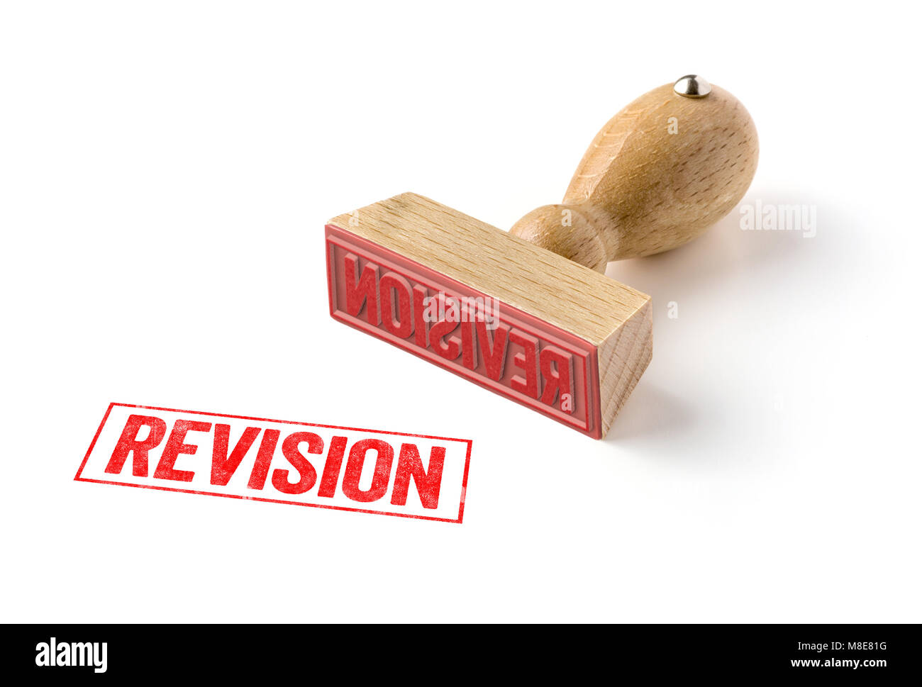 A rubber stamp on a white background - Revision Stock Photo - Alamy