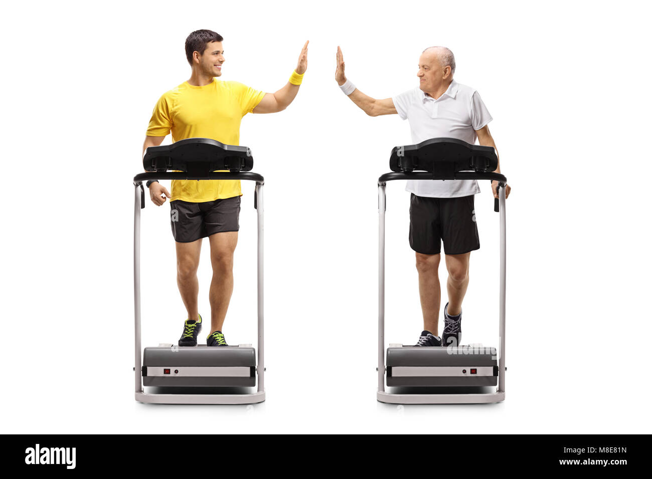 Full length profile shot of a young man and a senior walking on ...