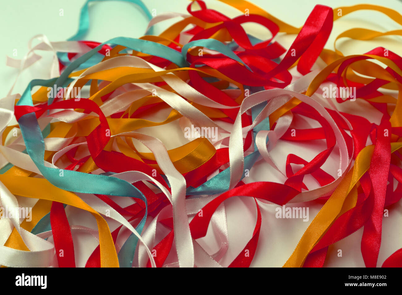 color satin ribbon scattered texture Stock Photo - Alamy