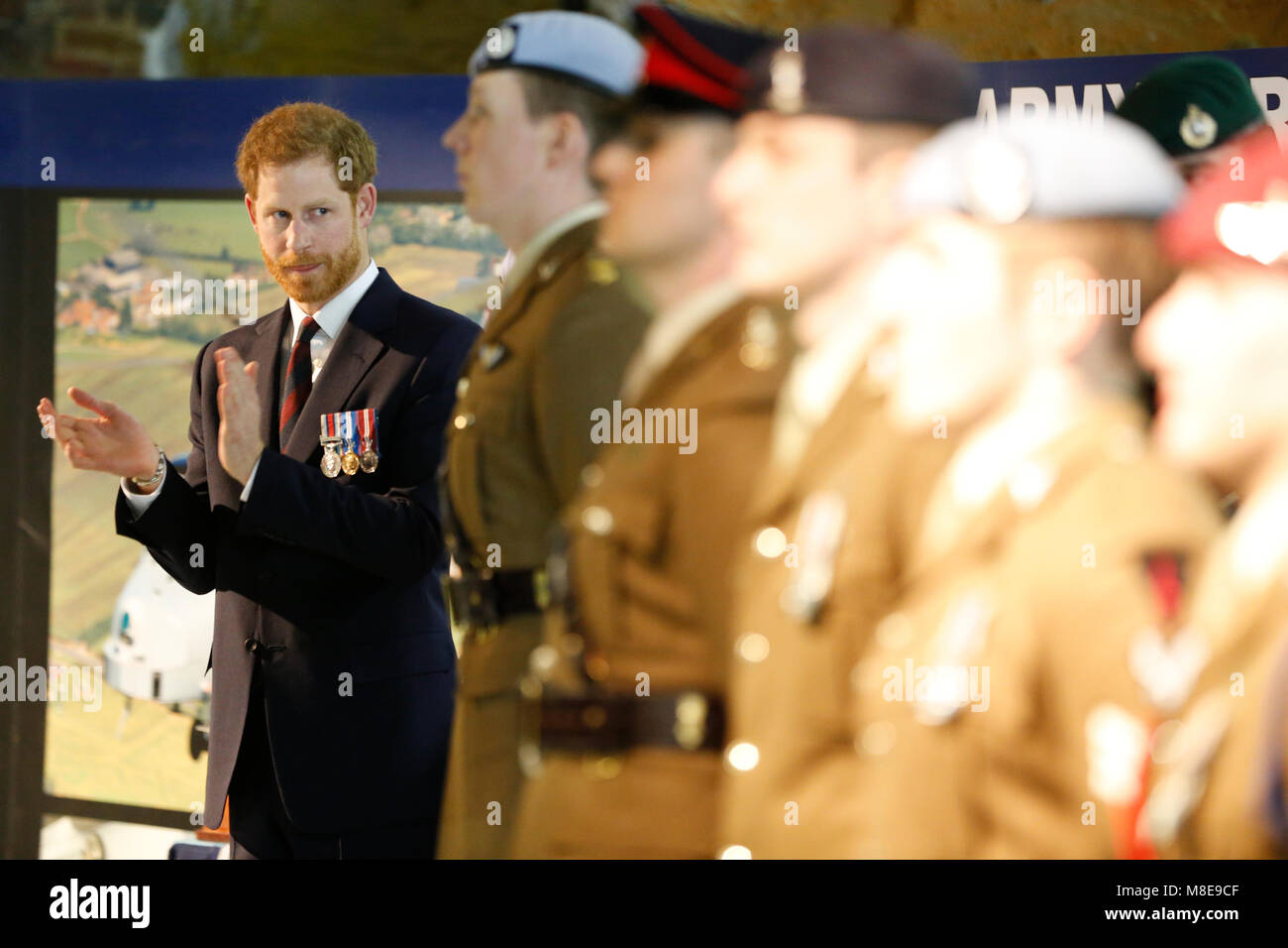 Prince Harry (left) during a visit to the Army Aviation Centre in ...