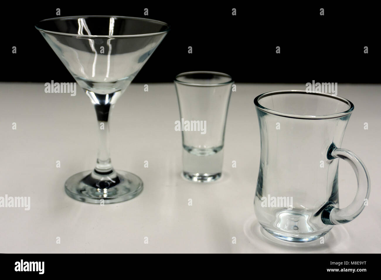 empty glassware Martini glass shooting Stock Photo - Alamy