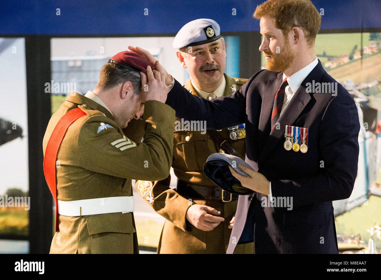 Prince Harry (right) during a visit to the Army Aviation Centre in ...