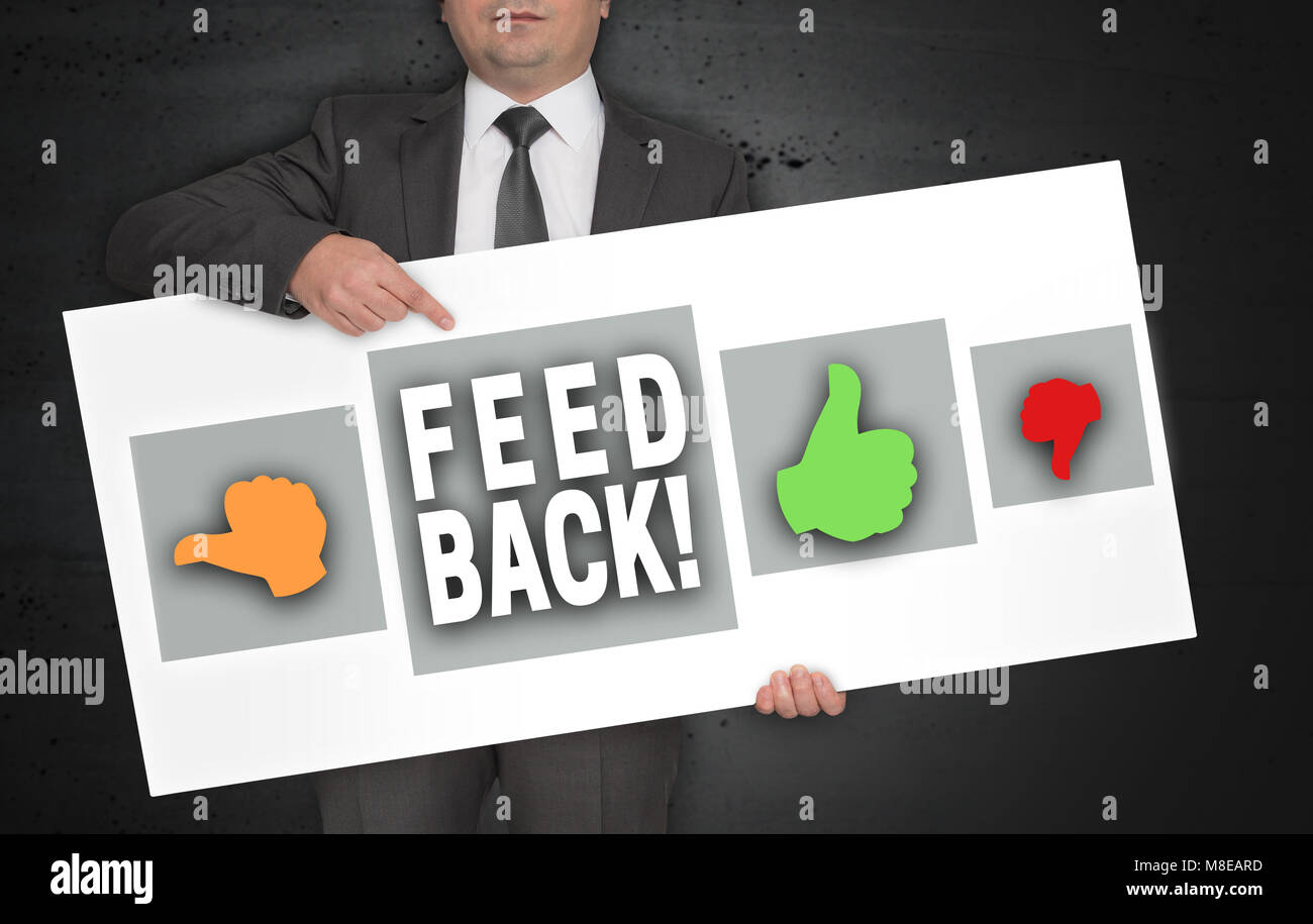 Feedback poster is held by businessman Stock Photo - Alamy
