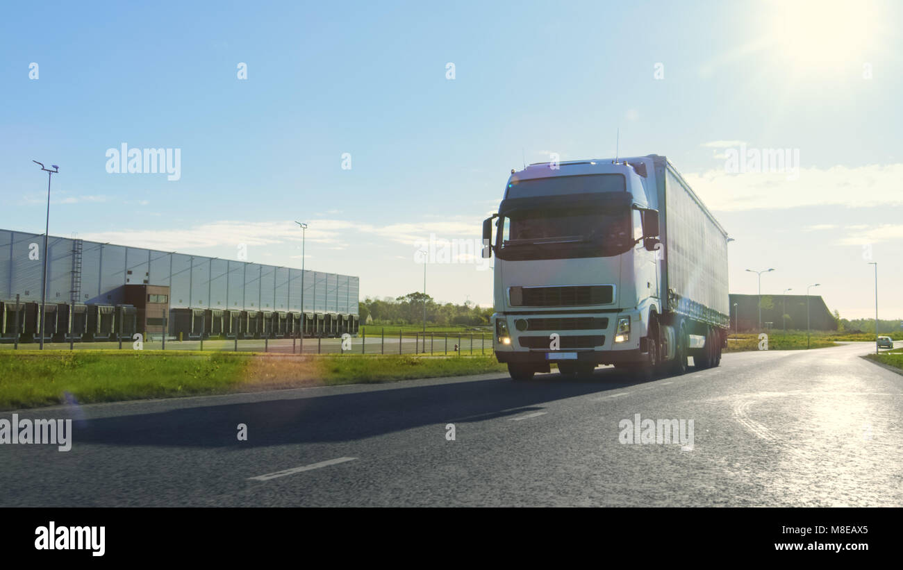 Front-View of Semi Truck with Cargo Trailer Driving on a Highway. He's ...
