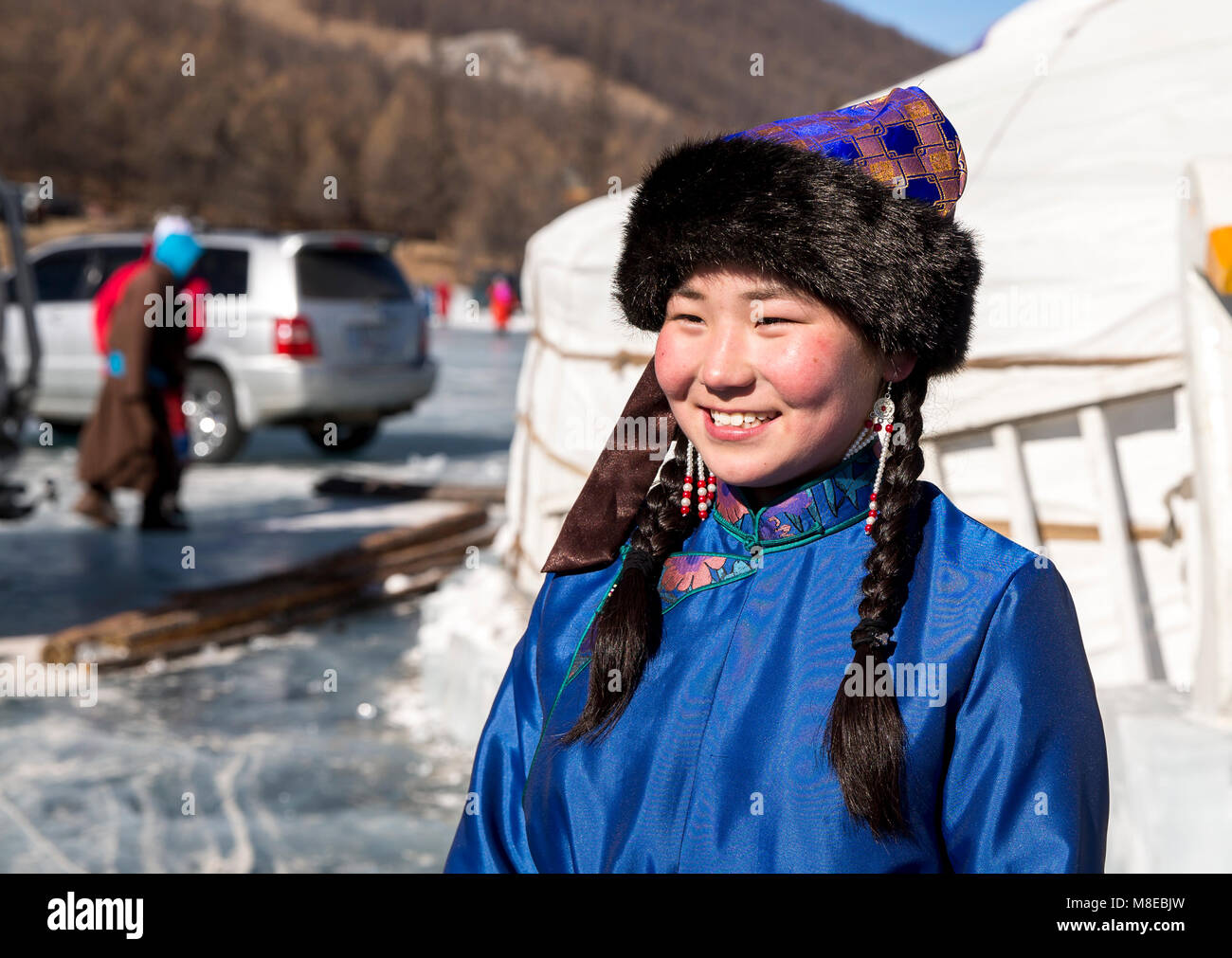 Hatgal, Mongolia, 4th March 2018: mongolian girl dressed in traditional ...