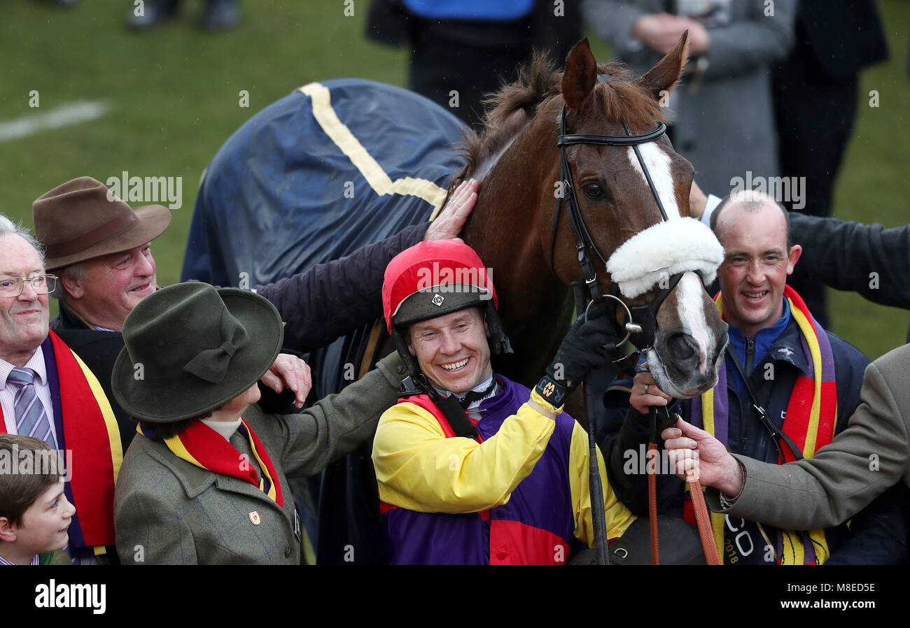 Richard Johnson celebrates his victory on Native River in the Timico ...