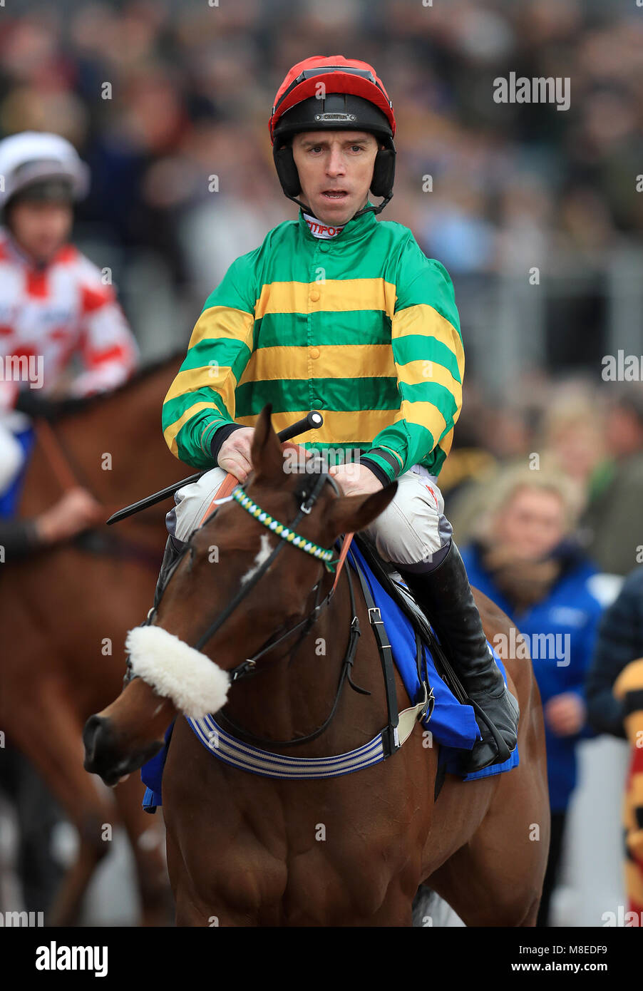 Jockey Leighton Aspell goes to post for the Coral Cup Handicap Hurdle ...