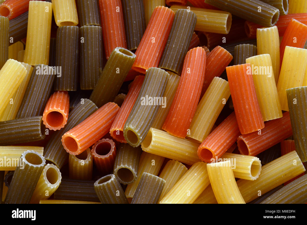 background with colored macaroni Stock Photo - Alamy