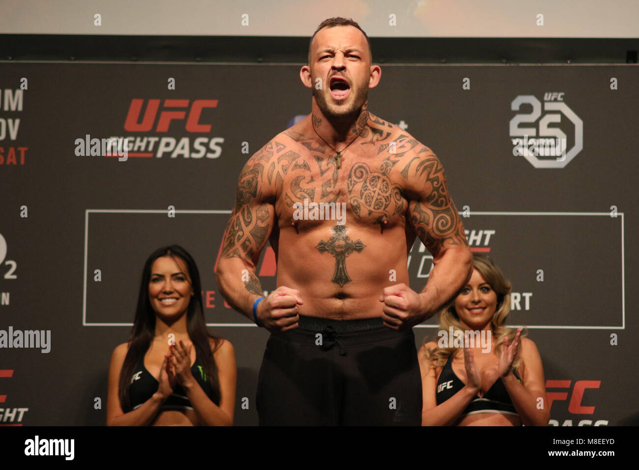 London, UK. 16th March, 2018. Mark Godbeer (Red Corner) weighs in ahead ...