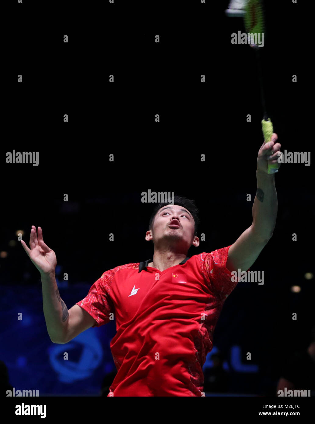 Birmingham, UK, 16th Mar, 2018. Lin Dan of China returns the shot ...
