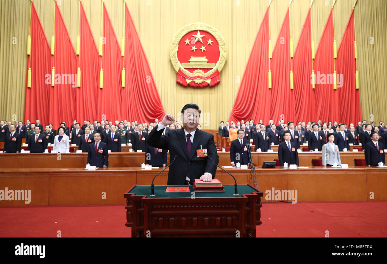 Beijing, China. 17th Mar, 2018. Xi Jinping takes a public oath of ...