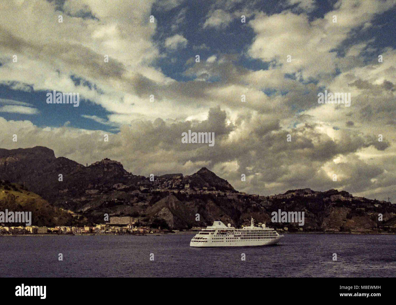 Taormina, Sicily, Italy. 12th Oct, 2004. A cruise ship in the bay below ...