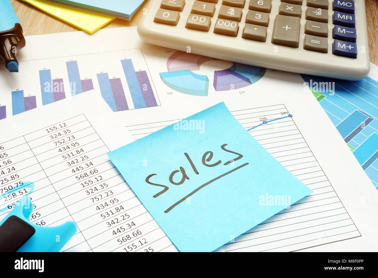 Stick with word sales and financial documents Stock Photo - Alamy