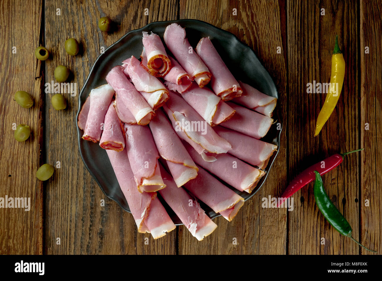 Ham cooked on old boards, rustic style Stock Photo - Alamy