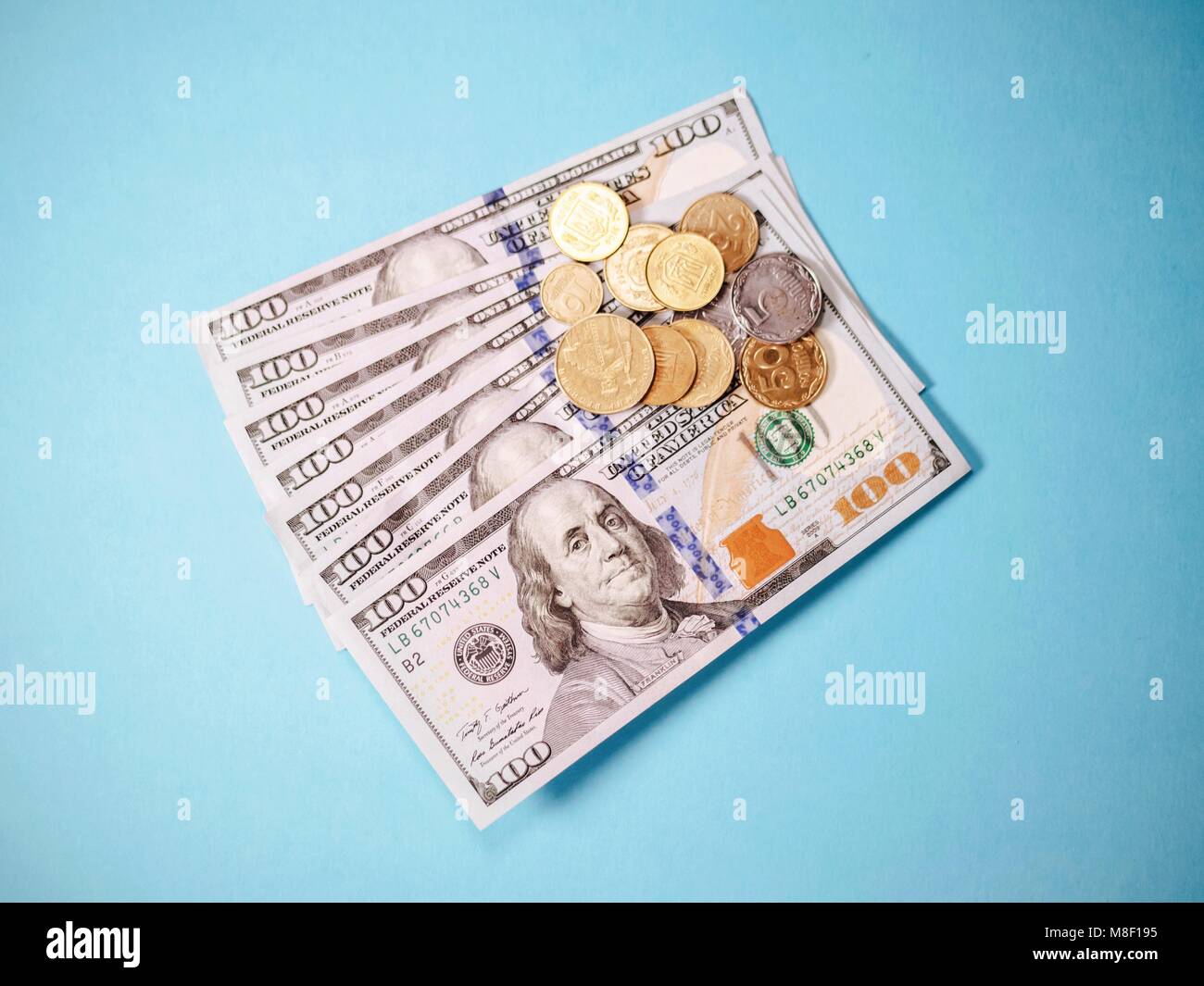 Close up of Various currency notes and coins from different countries ...