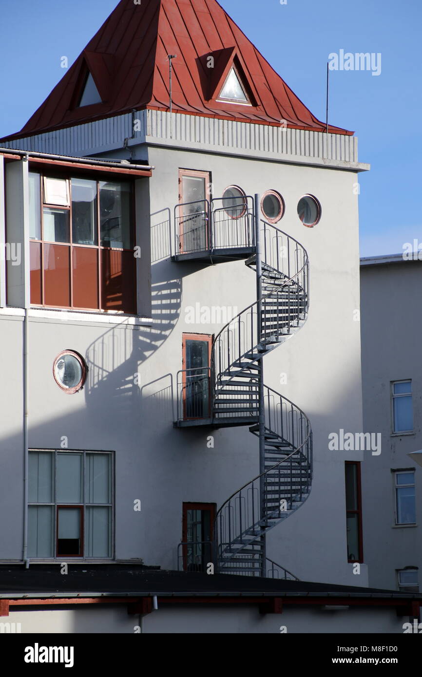 The winding staircase on the outside of the apartment Stock Photo - Alamy