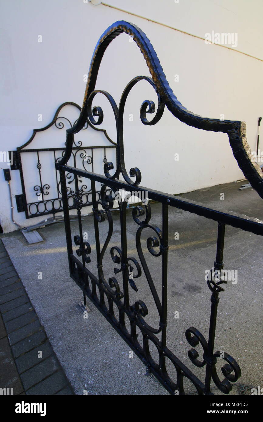 The black gate is open Stock Photo - Alamy