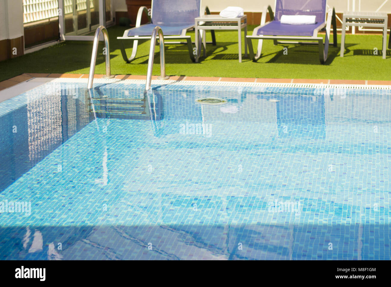 Summer pool with crystal clear water Stock Photo - Alamy