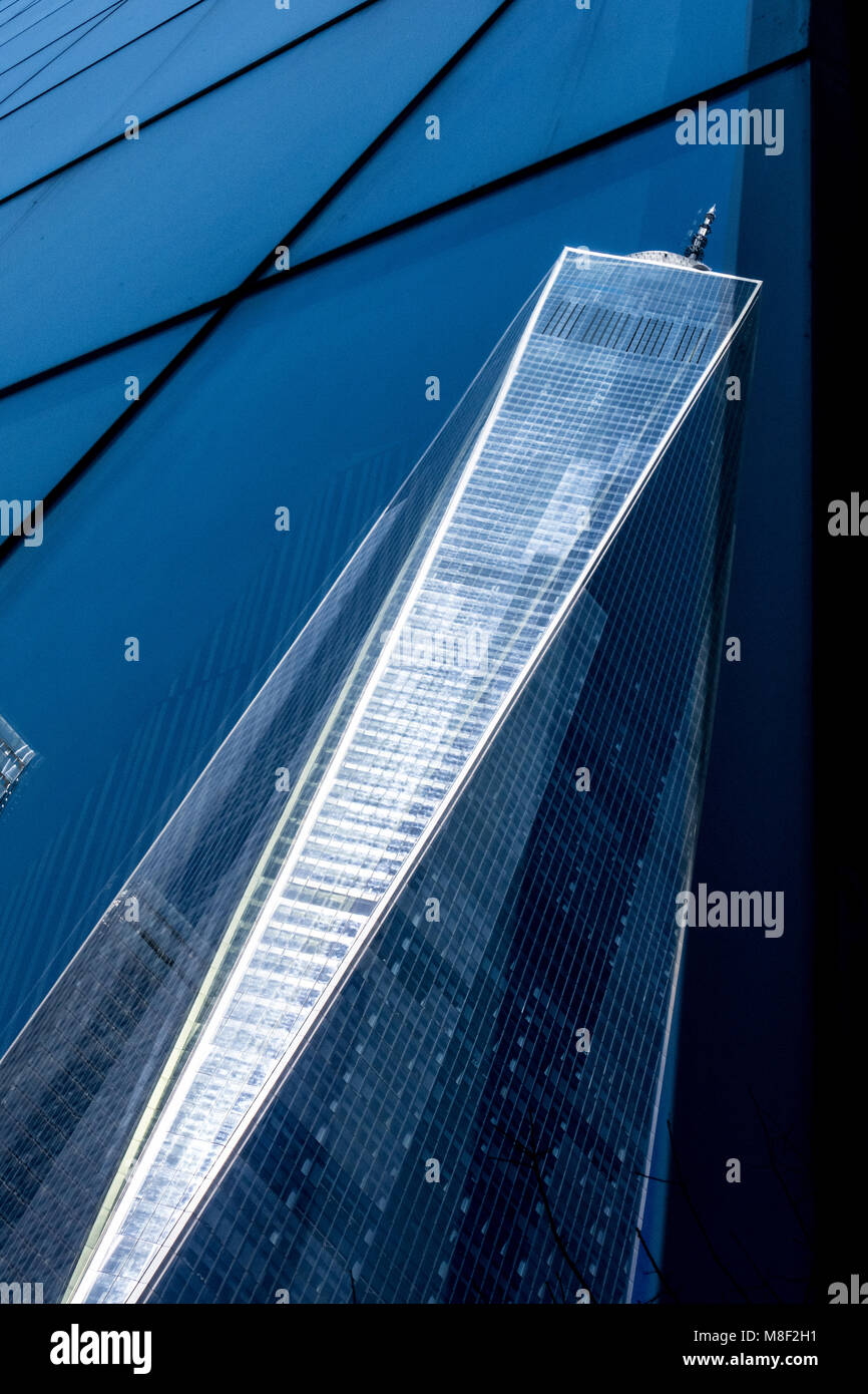 The Freedom Tower reflected in The neighboring Modern Glass and steel ...