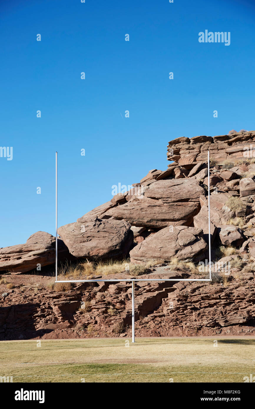 USA, Arizona, American football field goal with rocks in background ...