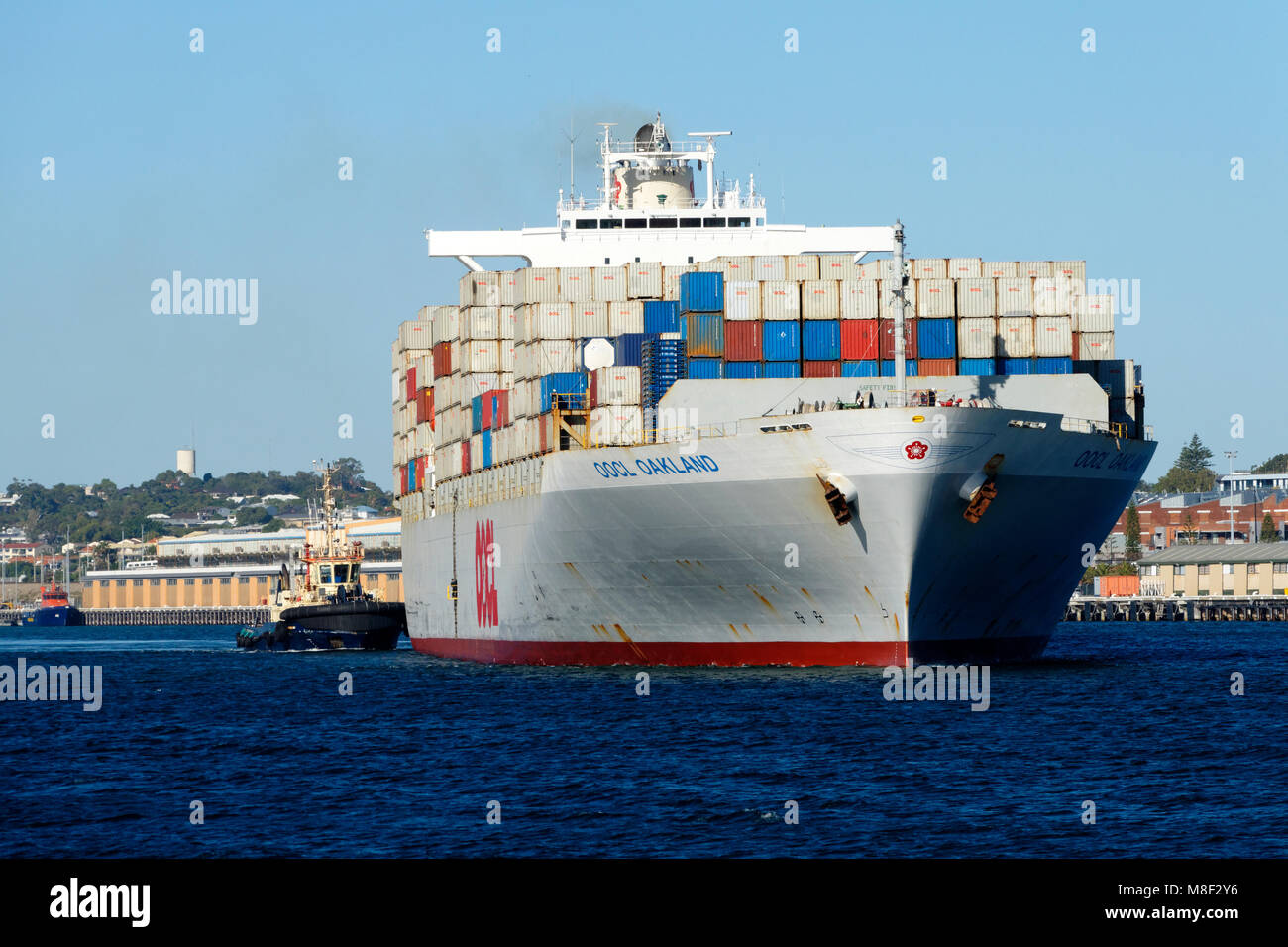 Container ship OOCL OAKLAND (Panama), leaving Fremantla harbour ...