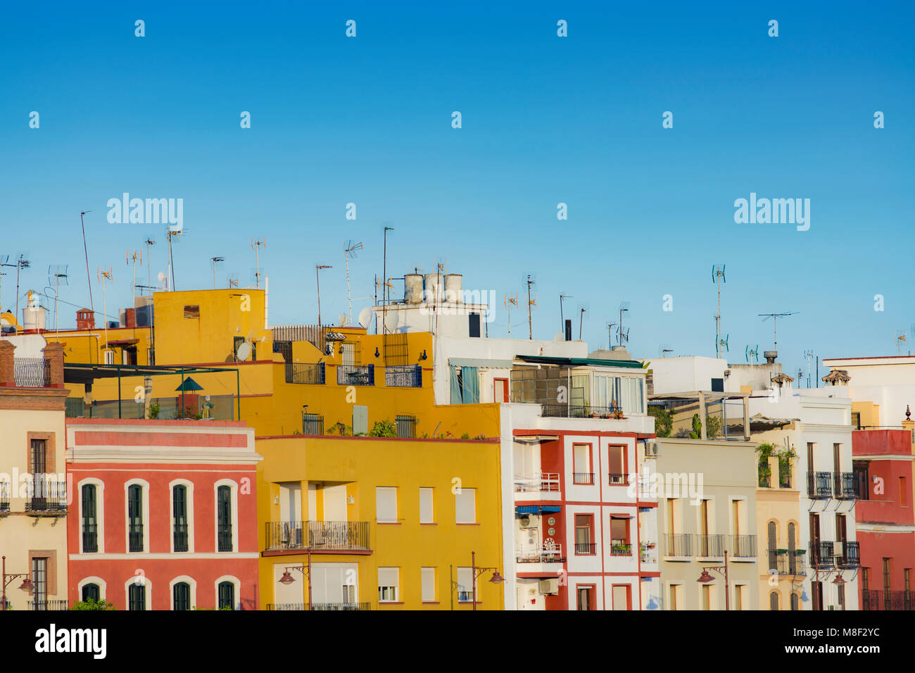 Spain, Seville, Triana, Colorful residential buildings Stock Photo - Alamy