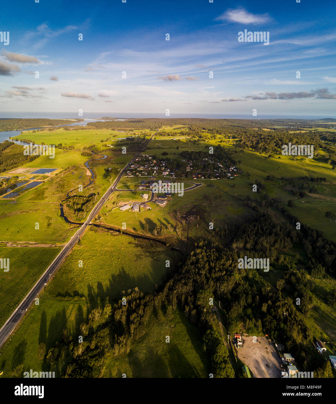 Australia, New South Wales, Moruya, Landscape with town and river Stock ...