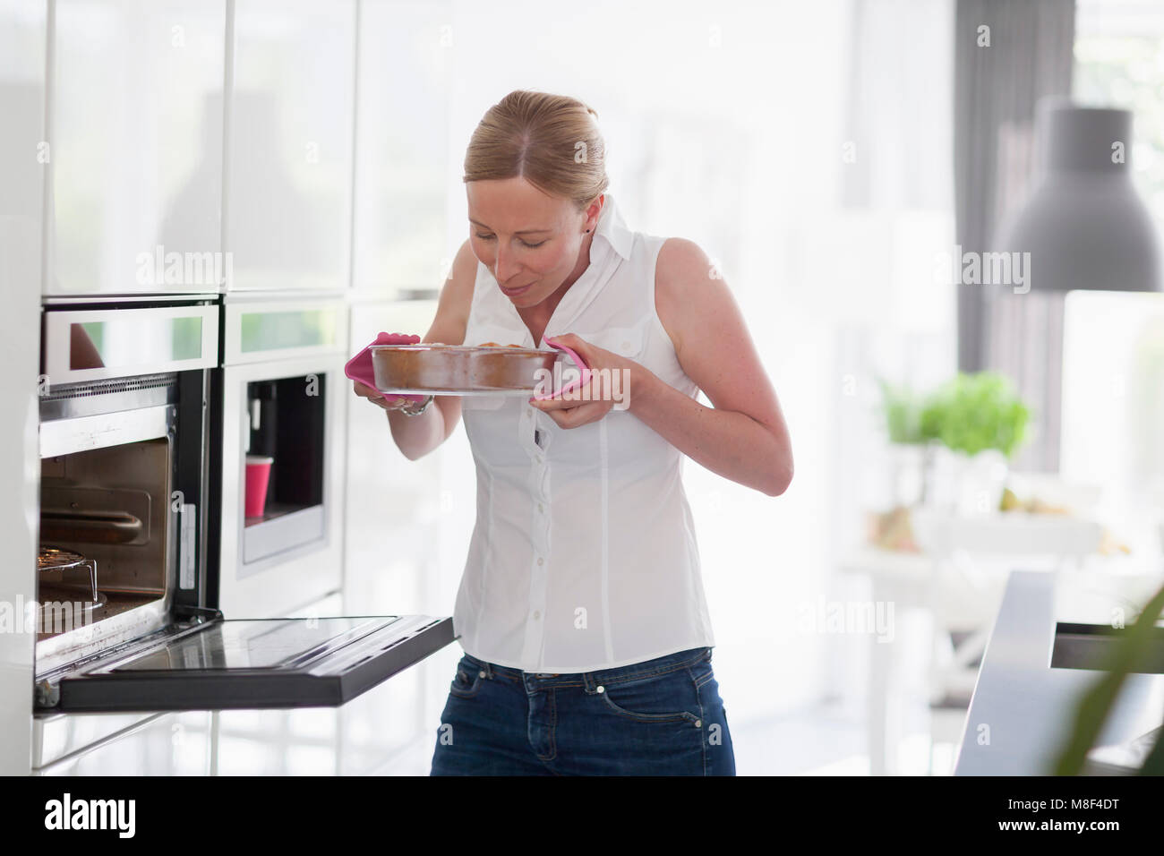 Person smelling cake hi-res stock photography and images - Alamy