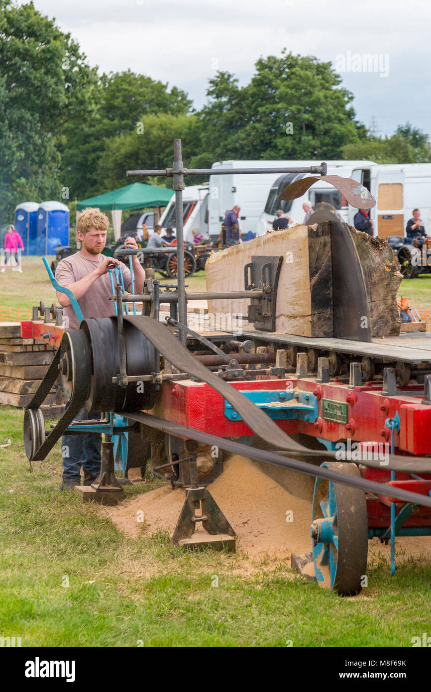 A demonstration of a saw bench driven by a traction engine at the 2017 ...