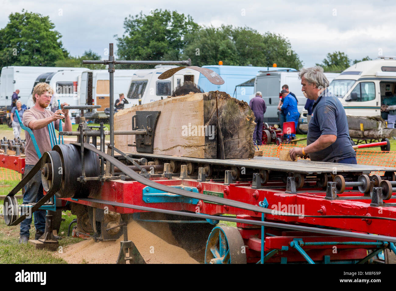A demonstration of a saw bench driven by a traction engine at the 2017 ...