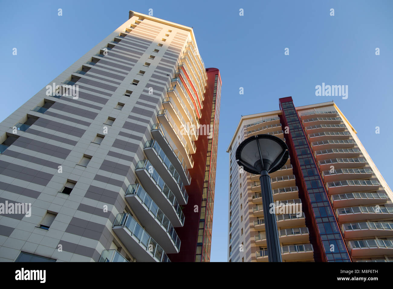 Modern apartment buildings exteriors background / condo with office ...