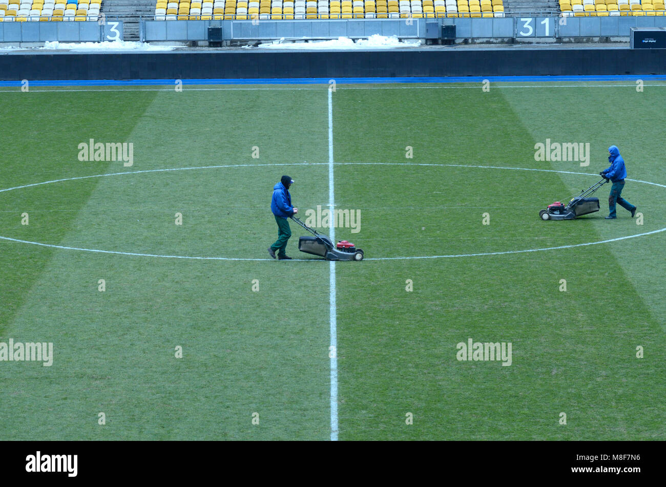 Cleaning football pitch hi-res stock photography and images - Alamy