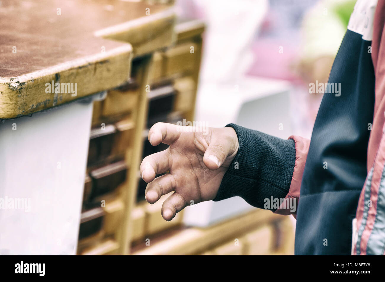 a man's hand makes a gripping gesture Stock Photo - Alamy