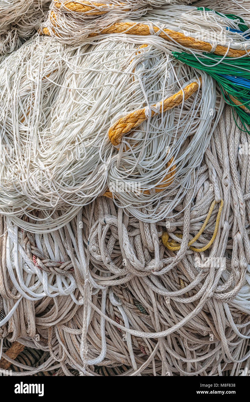 fishing nets and rope on a big heap Stock Photo - Alamy