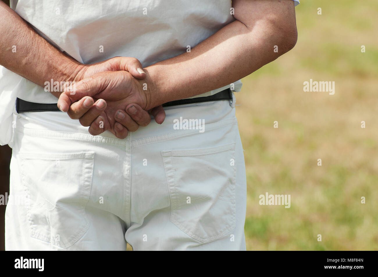 Back view man hands behind his hi-res stock photography and images - Alamy