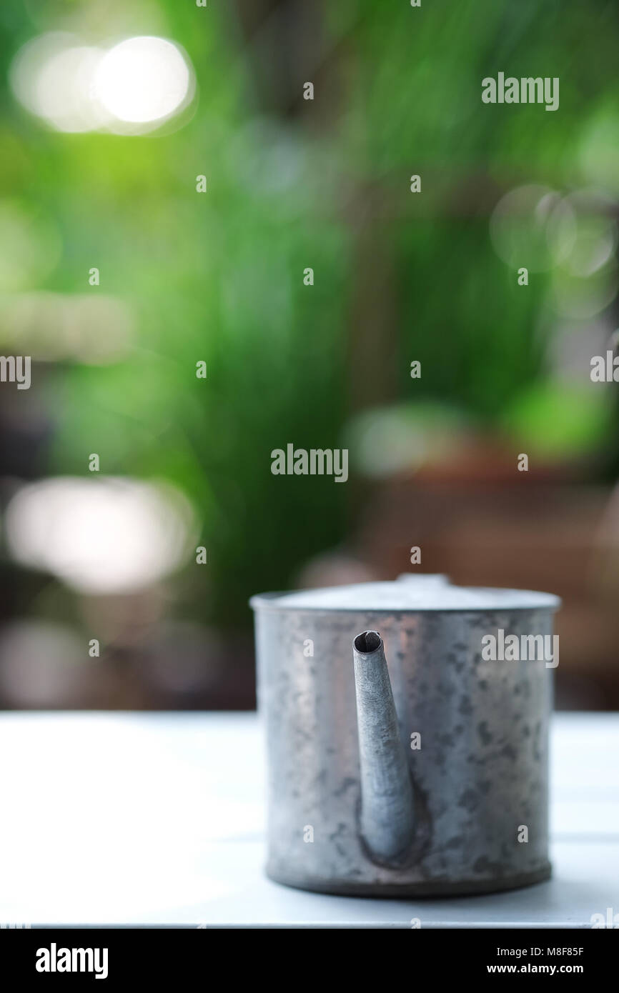 Watering Can background Stock Photo - Alamy