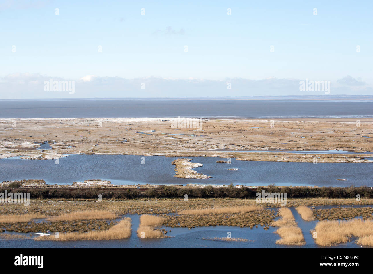 Frozen saltmarshes between Warton and Silverdale that are home to many ...