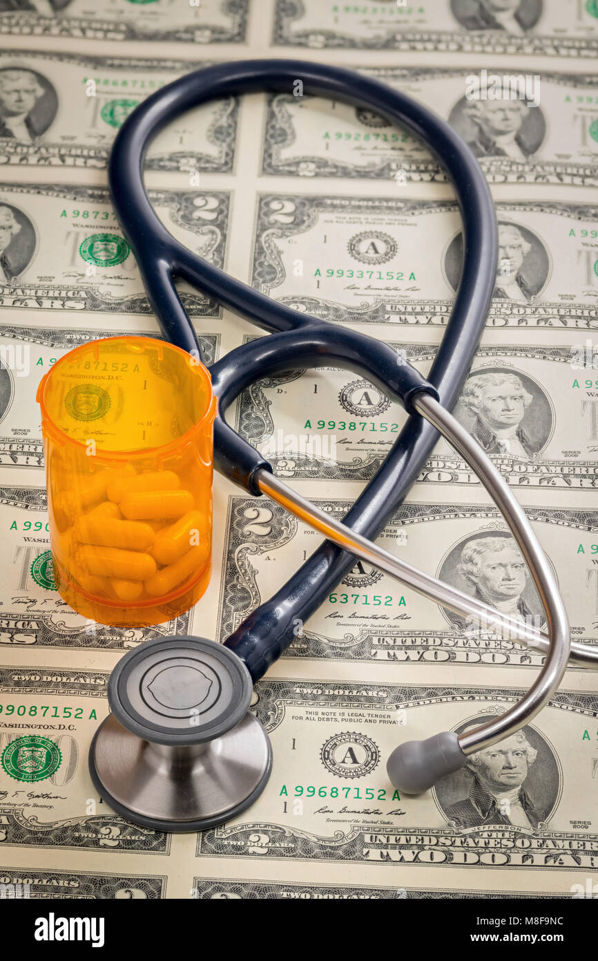 Money and metical tools from a doctor Stock Photo - Alamy
