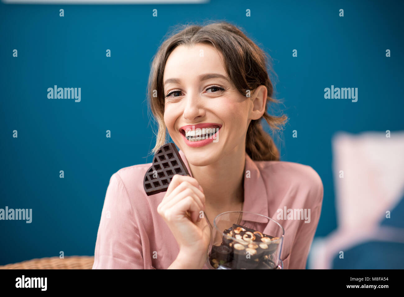 Woman enjoying a chocolate indoors Stock Photo - Alamy Woman enjoying a chocolate indoors Stock Photo - Alamy