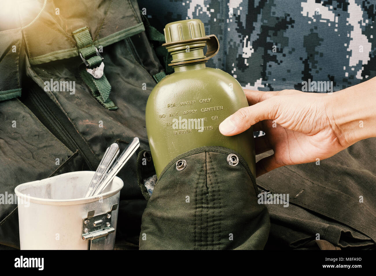 The military water canteen, military water bottle Stock Photo - Alamy