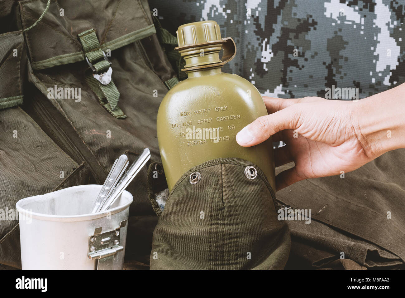 The military water canteen, military water bottle Stock Photo - Alamy