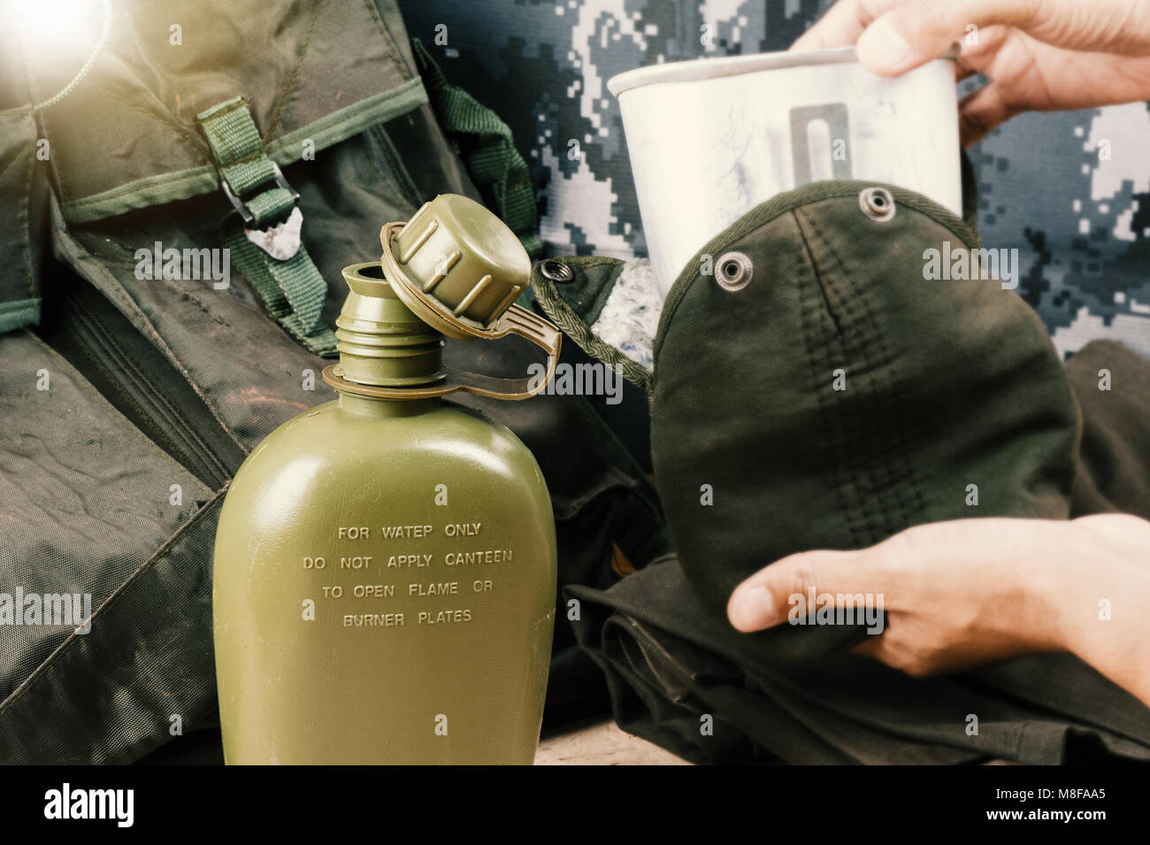 an empty military water canteen, military water bottle Stock Photo - Alamy