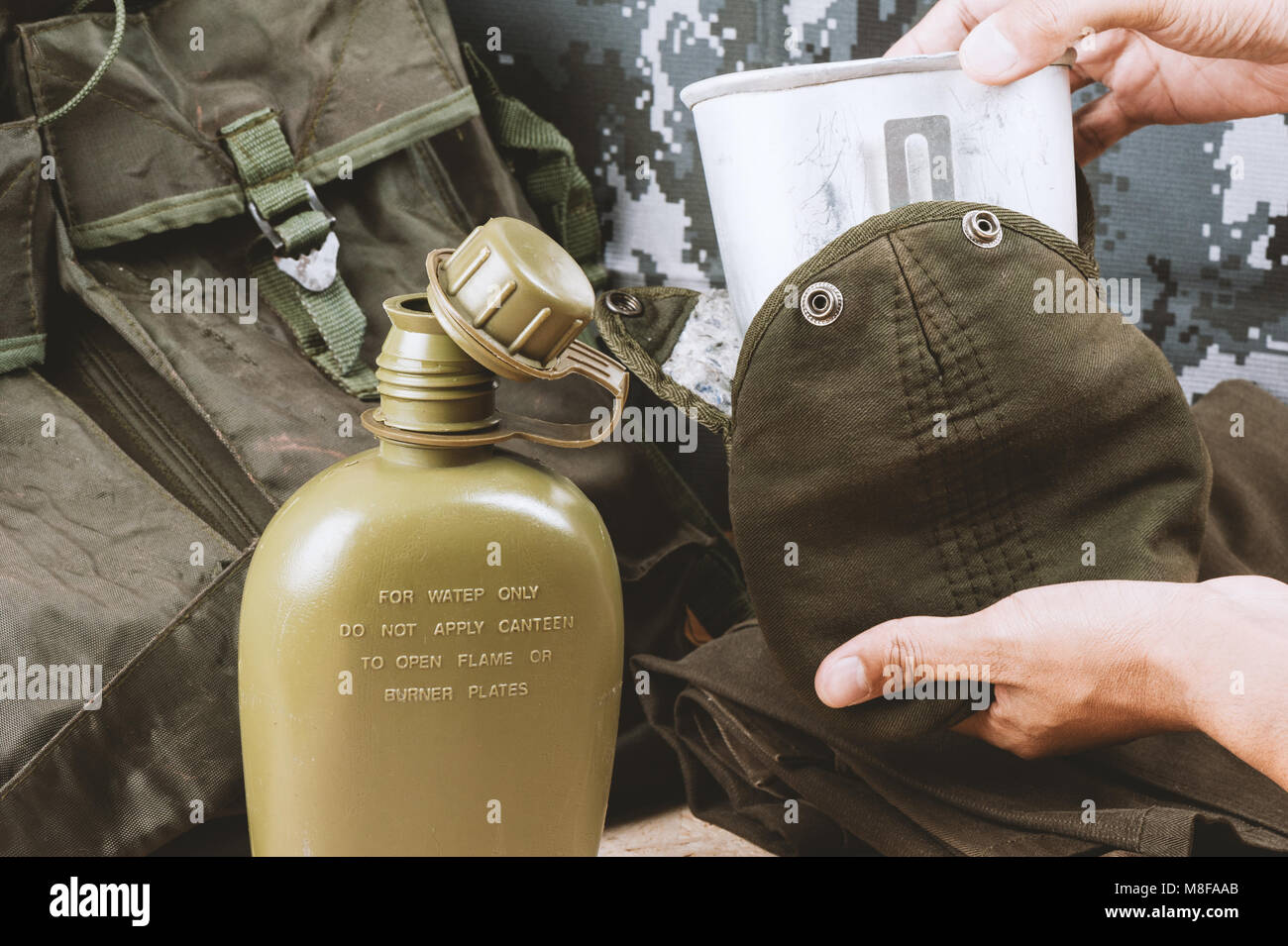 an empty military water canteen, military water bottle Stock Photo - Alamy