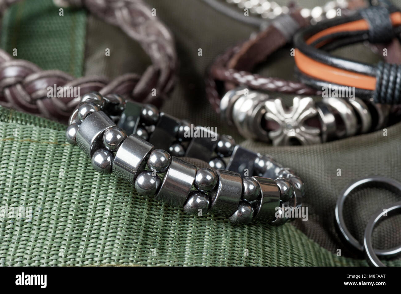 closeup chrome bracelet for men, men's accessories Stock Photo - Alamy