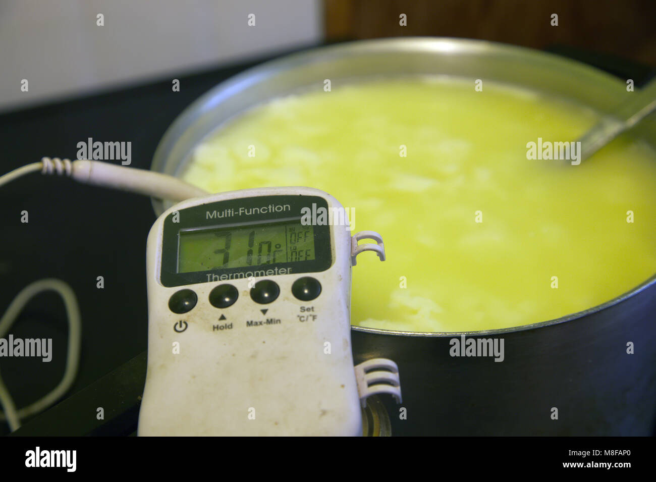 Domestic making of Lancashire Cheese - curds formation after adding ...