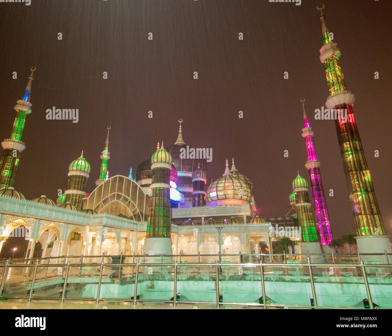 Colourful views of the Masjid Kristal (Crystal Mosque) at night, Kuala ...
