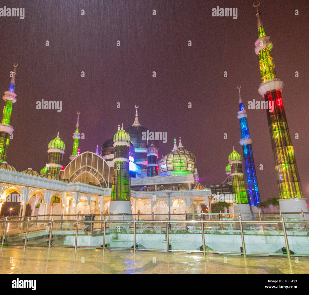 Colourful views of the Masjid Kristal (Crystal Mosque) at night, Kuala ...